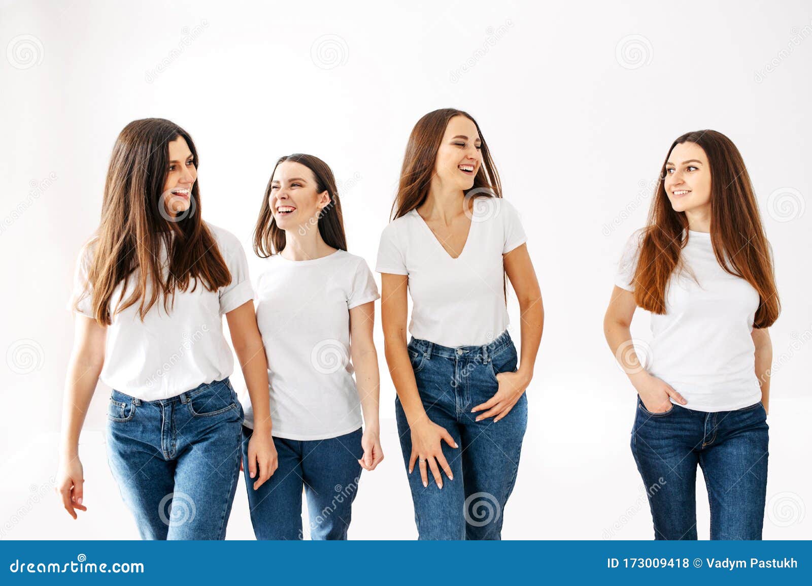 Happy Active Girls in Identical Clothes Stock Photo - Image of ...