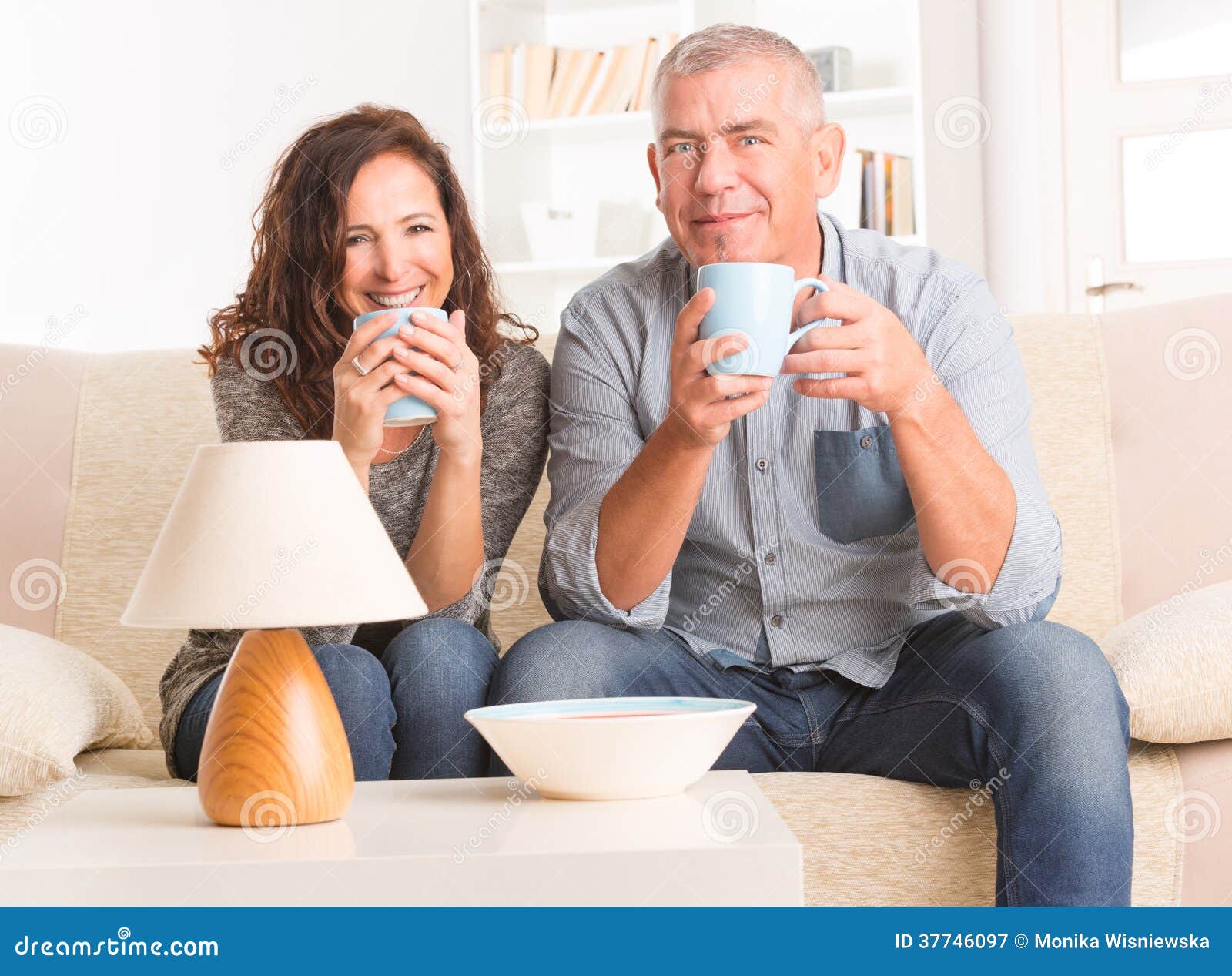 Happy adults stock image. Image of couple, cheerful, grey - 37746097