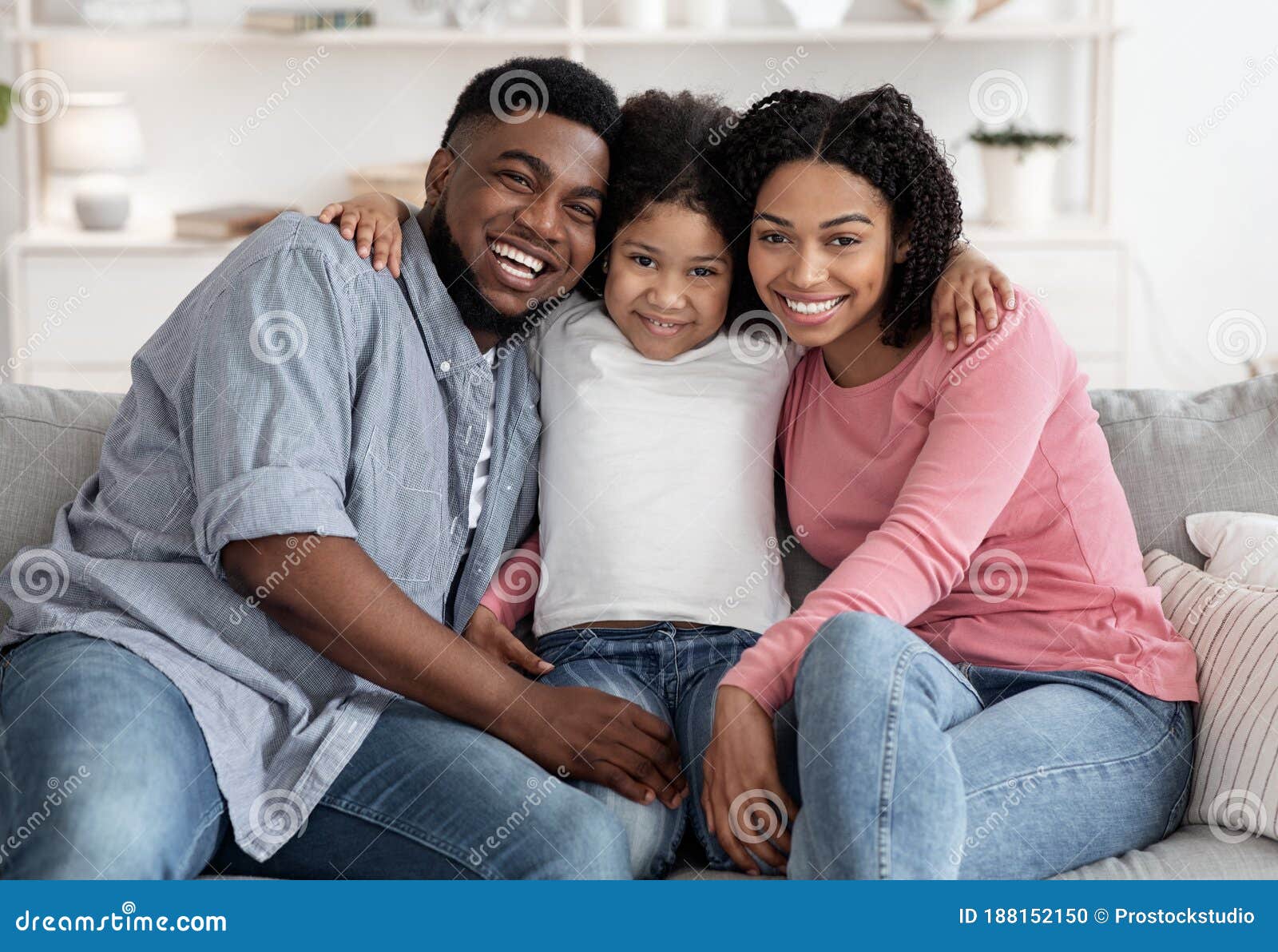 Happy African American Family Posing for Portrait at Home, Embracing ... Happy African American Family Posing for Portrait at Home, Embracing ...