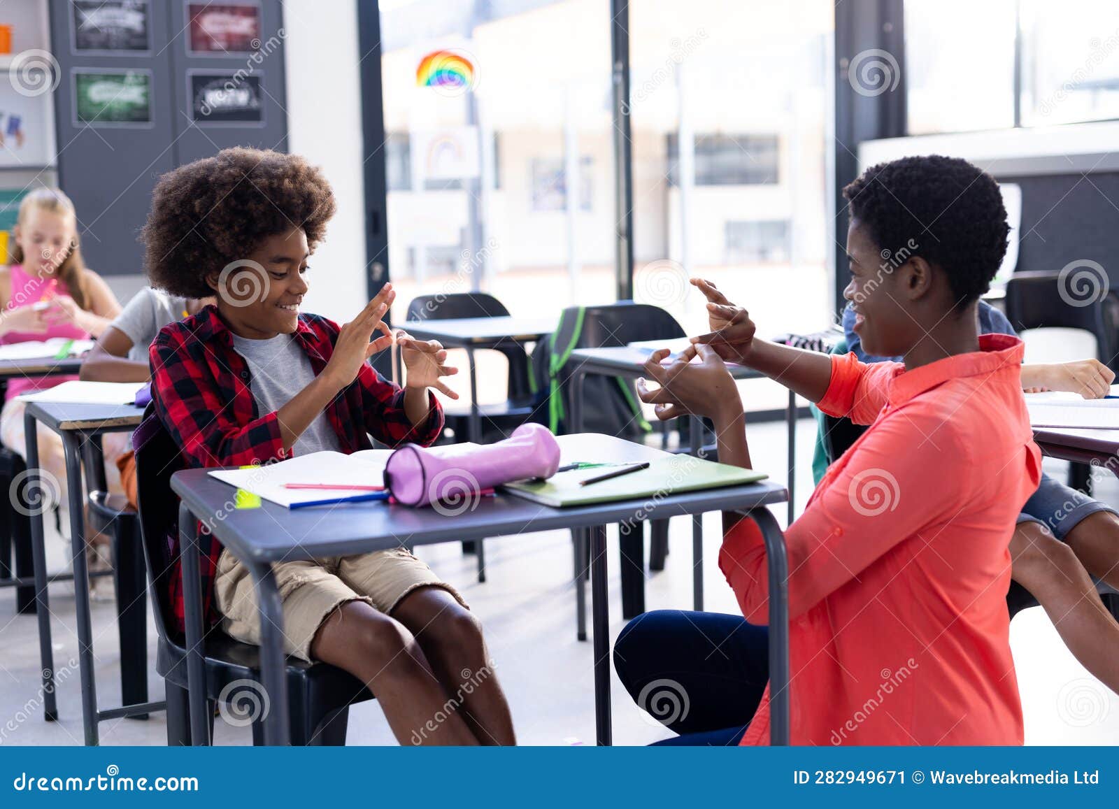 Happy African American Female School Teacher and Boy Practicing Sign ...