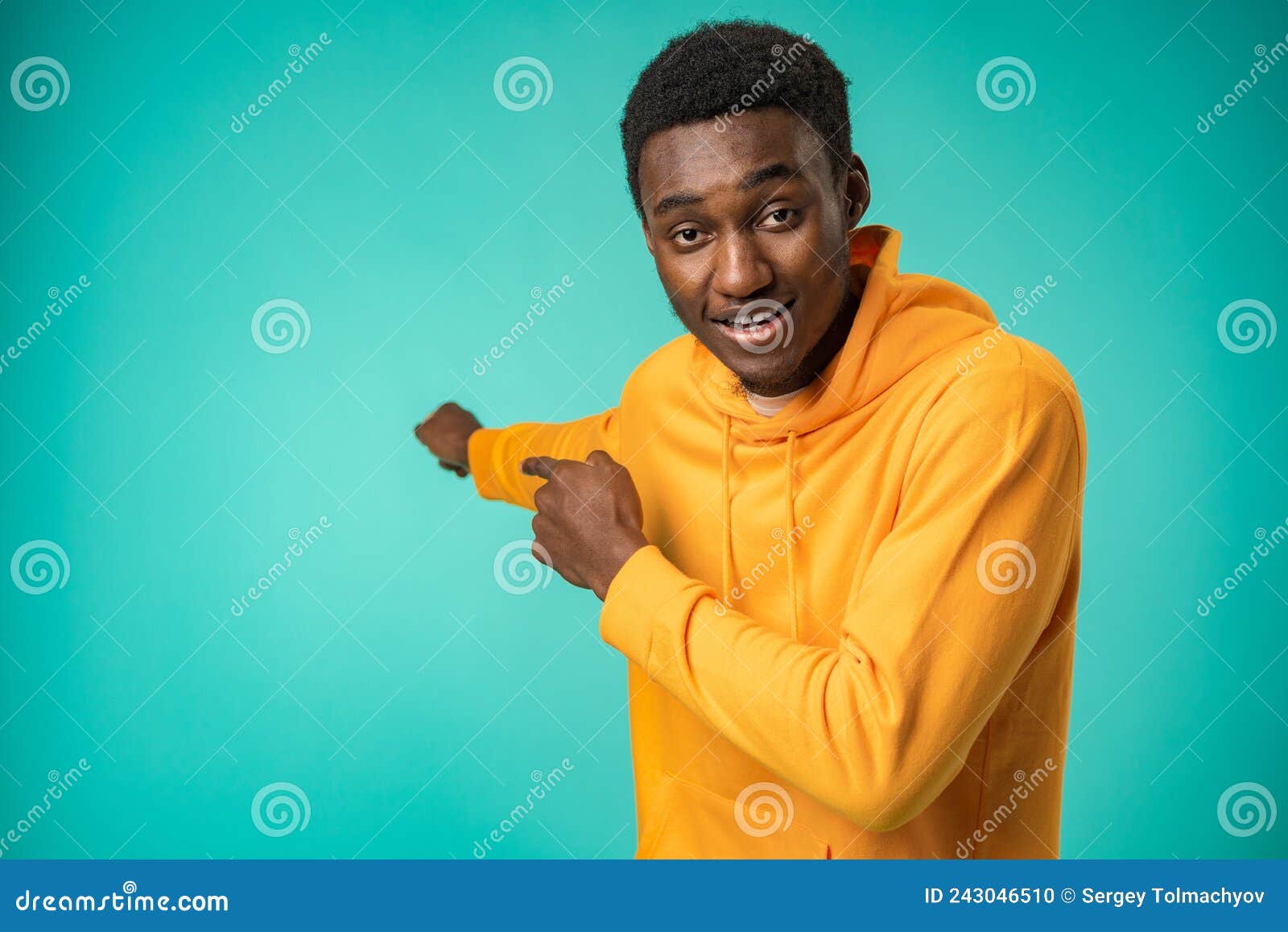 Happy African American Man Pointing Finger at Copy Space Stock Photo ...