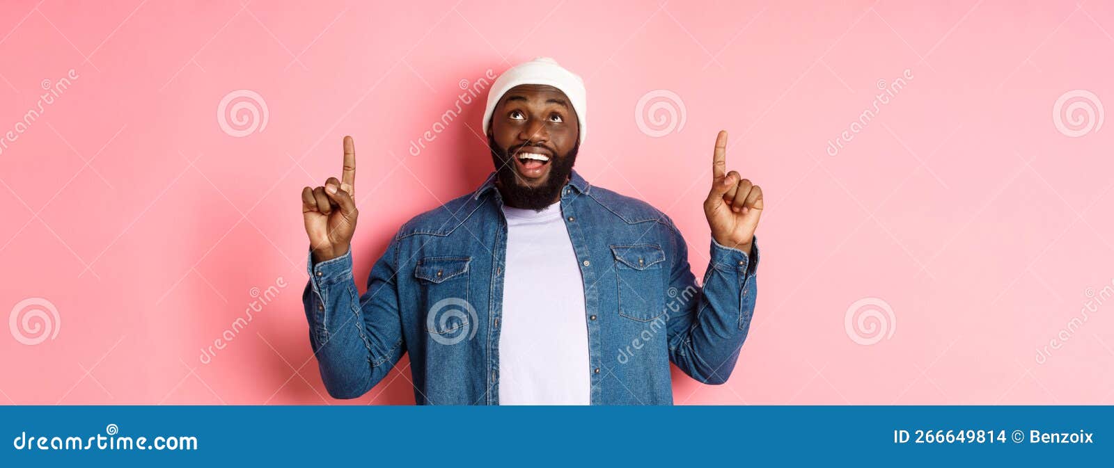 Happy African American Man Showing Advertisement Smiling Amazed And