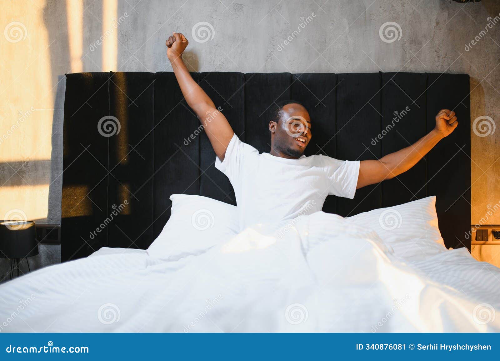 Happy African American Man Waking Up in Bed Stock Image - Image of home ...