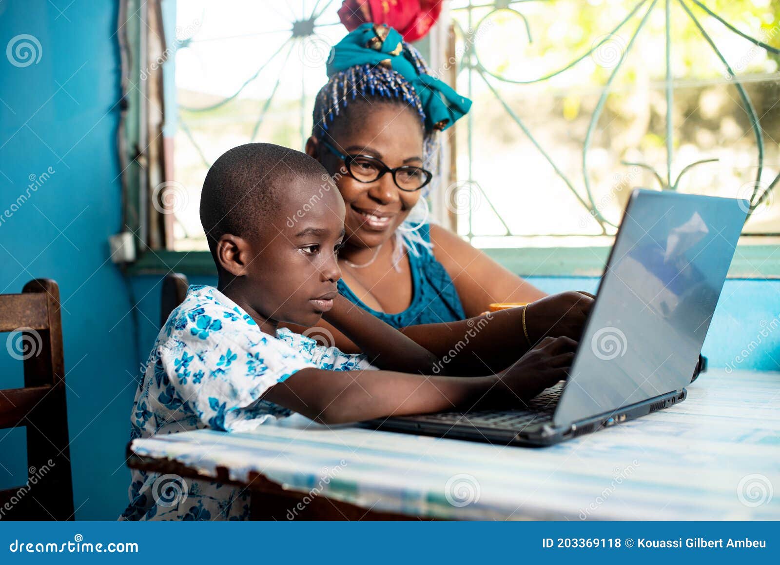 Mother in Son Using a Laptop Stock Photo - Image of african, learning ... Mother in Son Using a Laptop Stock Photo - Image of african, learning ...