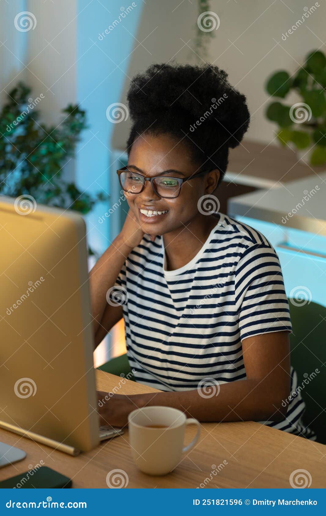 Happy African Female Successful Freelancer Working On Desktop Computer