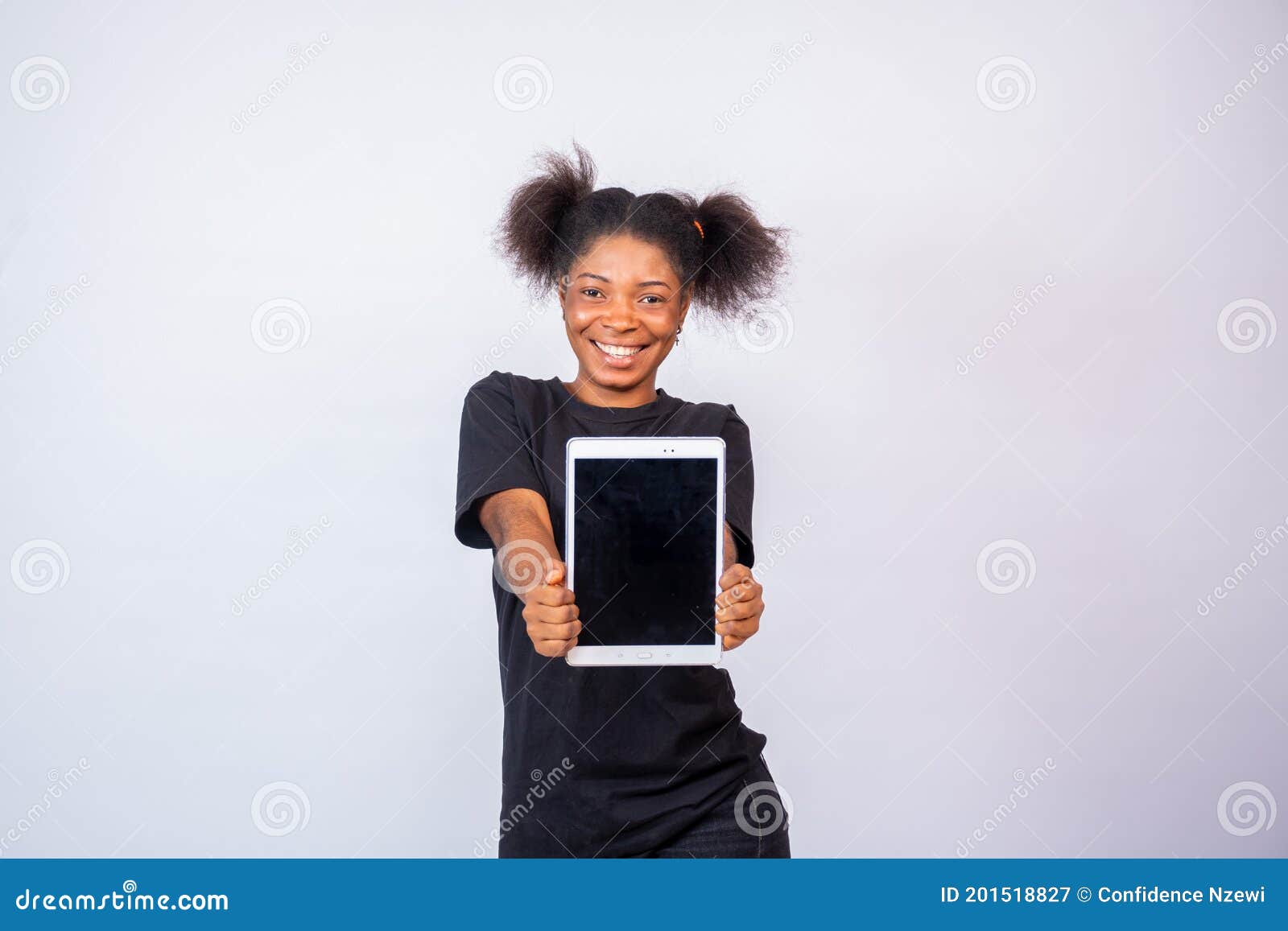 Happy African Lady Holding Forward a Tablet Computer with the Screen ...