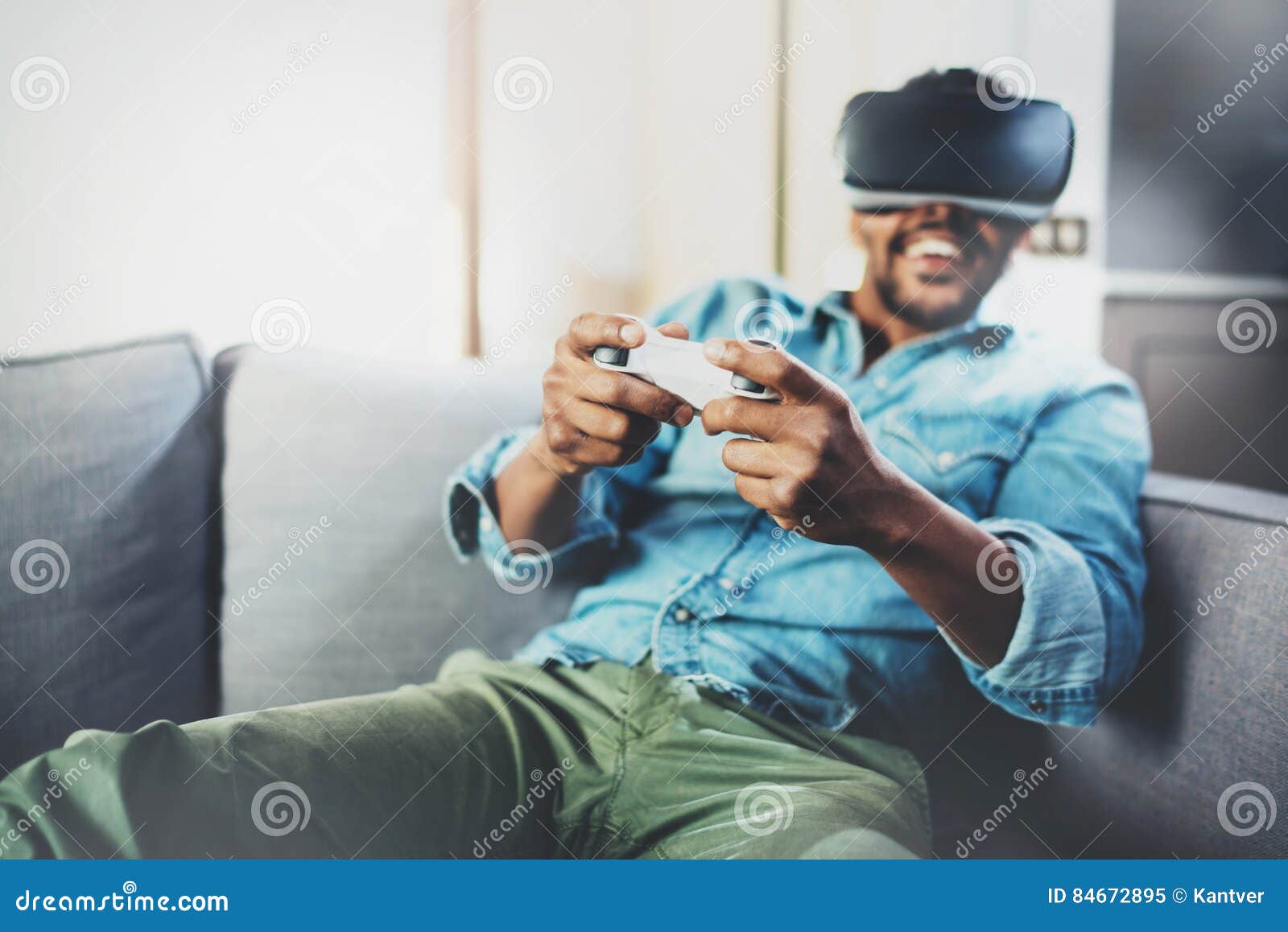 Happy African Man Enjoying Virtual Reality Glasses while Sitting on ...
