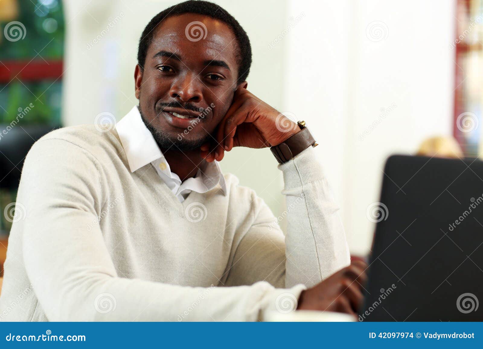 Happy African Man Sitting at the Table Stock Photo - Image of modern ...