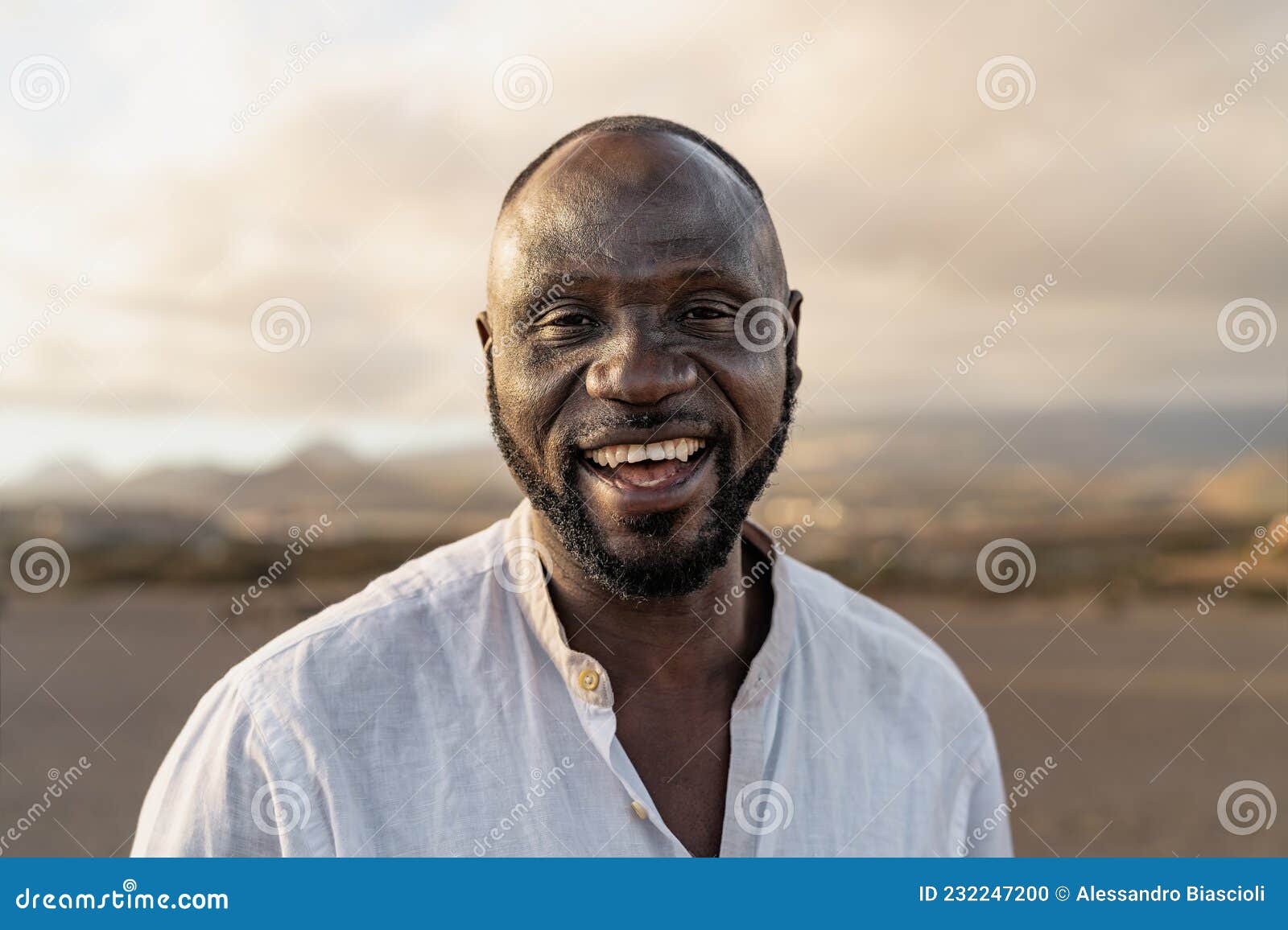 Happy African Man Smiling in Camera on the Beach during Summer Stock ...