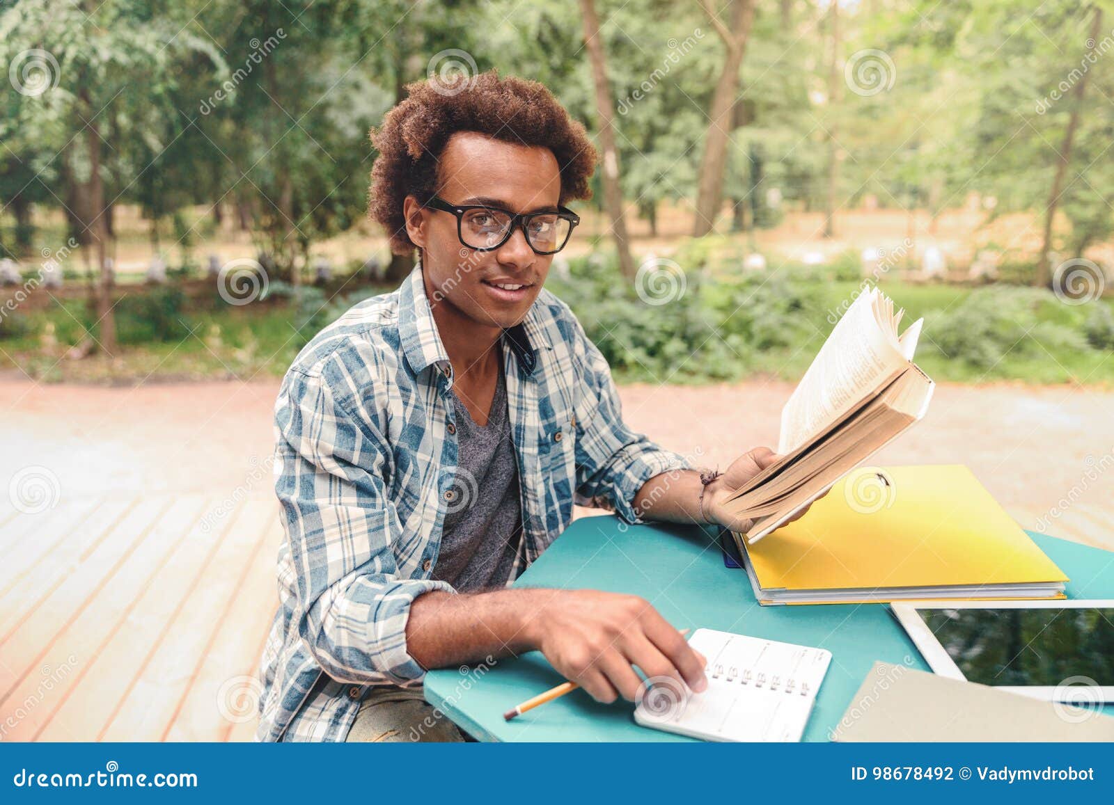 Happy African Man Studying Outdoors Stock Photo - Image of camera ...