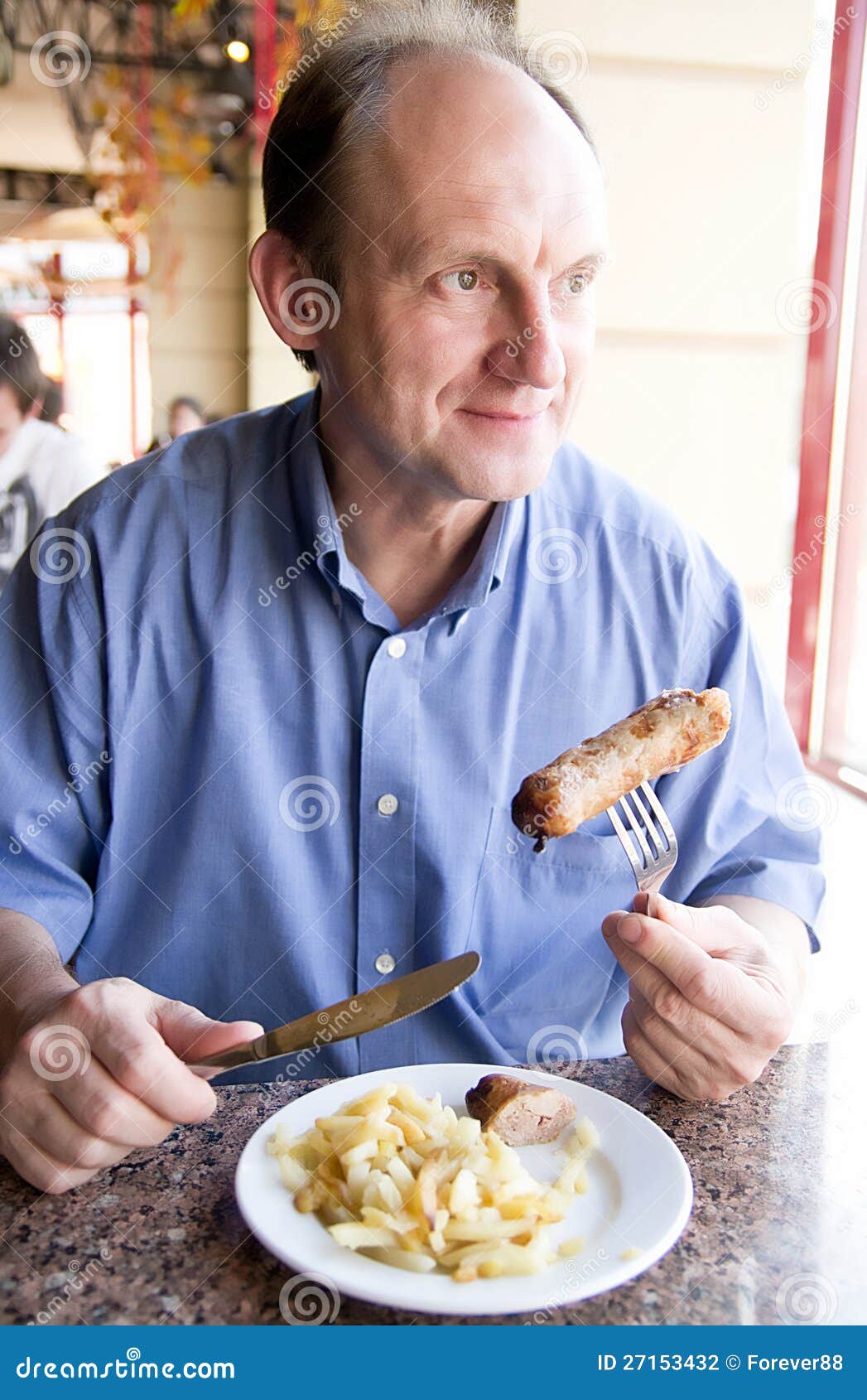Happy aged man eating stock photo. Image of breakfast - 27153432
