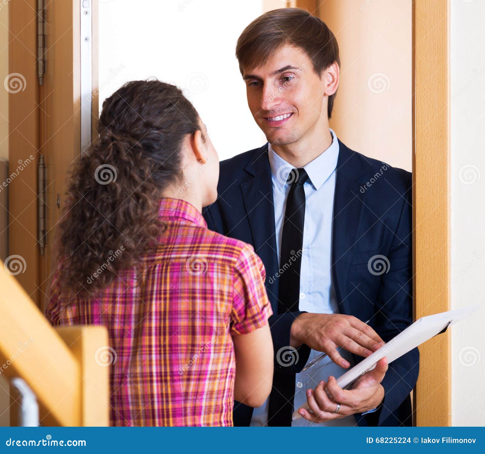Happy agent with documents stock photo. Image of financial - 68225224