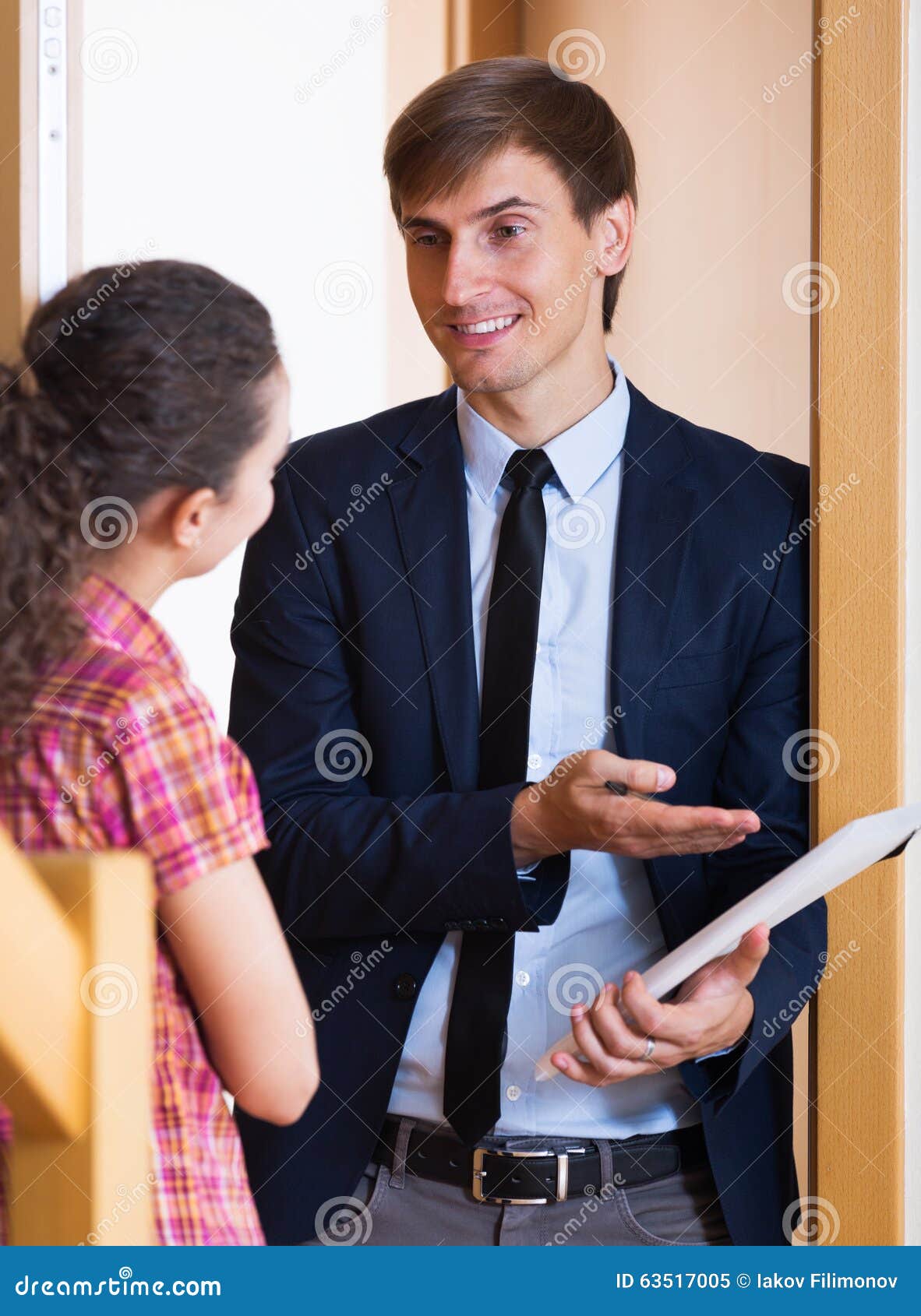 Happy agent with documents stock image. Image of buying - 63517005