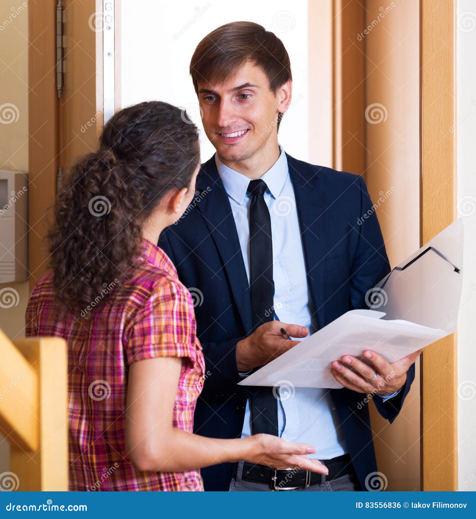 Happy agent with documents stock photo. Image of interview - 83556836