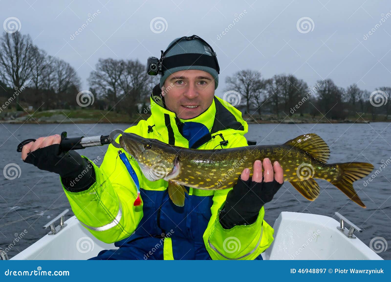Happy angler with pike stock image. Image of fishing - 46948897