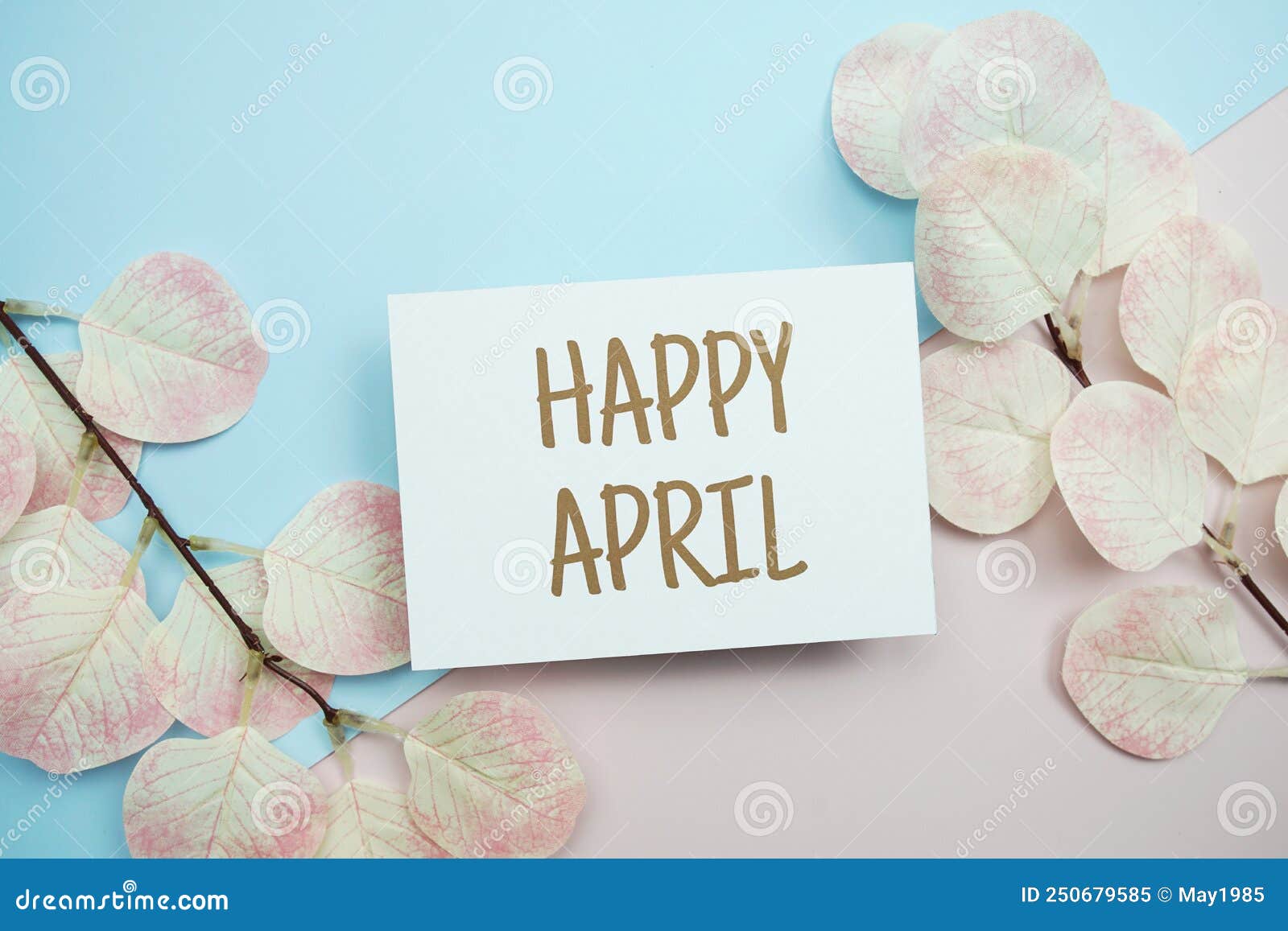Happy April Text Message with Artificial Leave on Blue and Pink ...