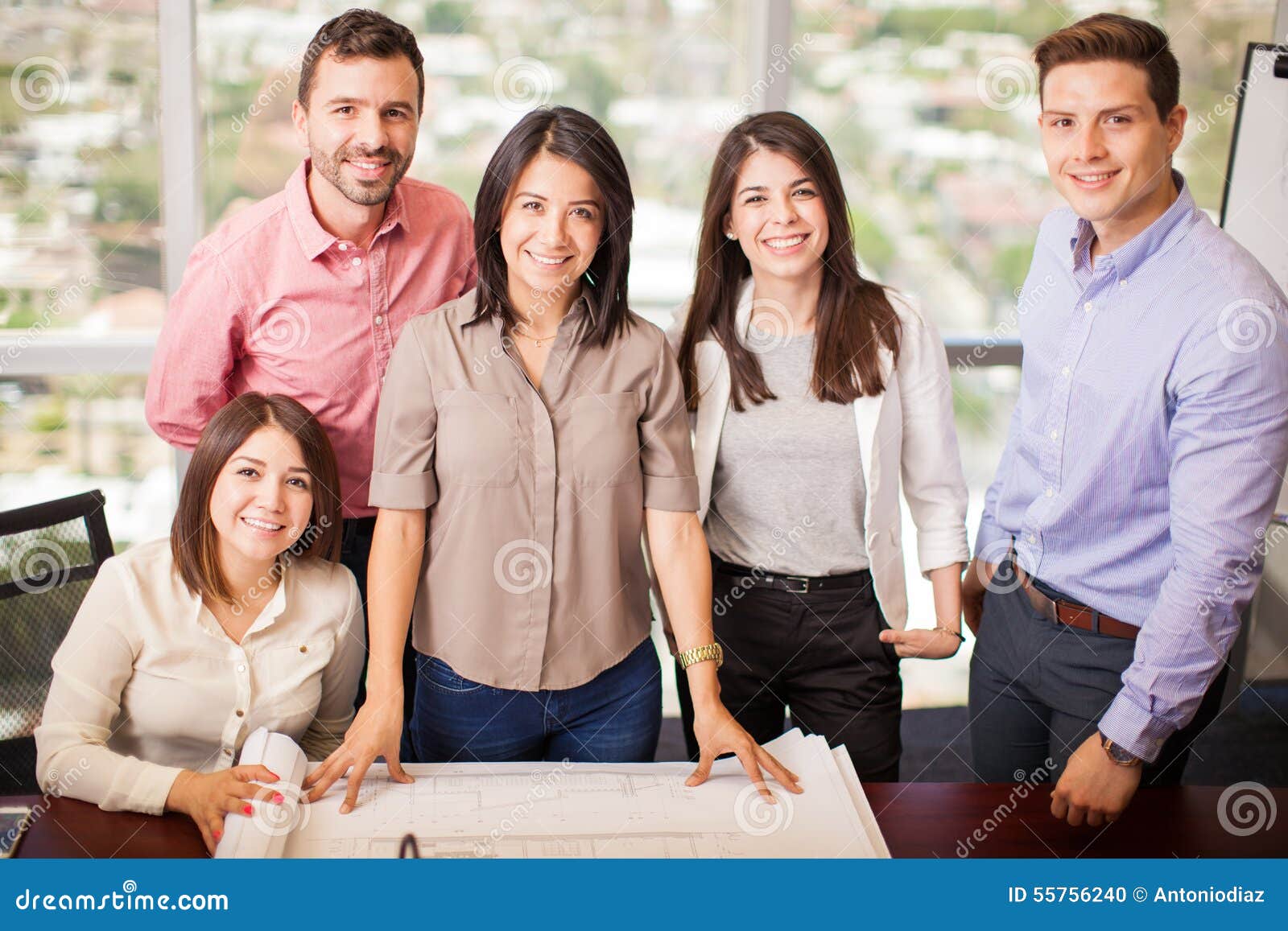 Group Of Hispanic Women Clapping And Sitting On The Table Royalty-Free ...