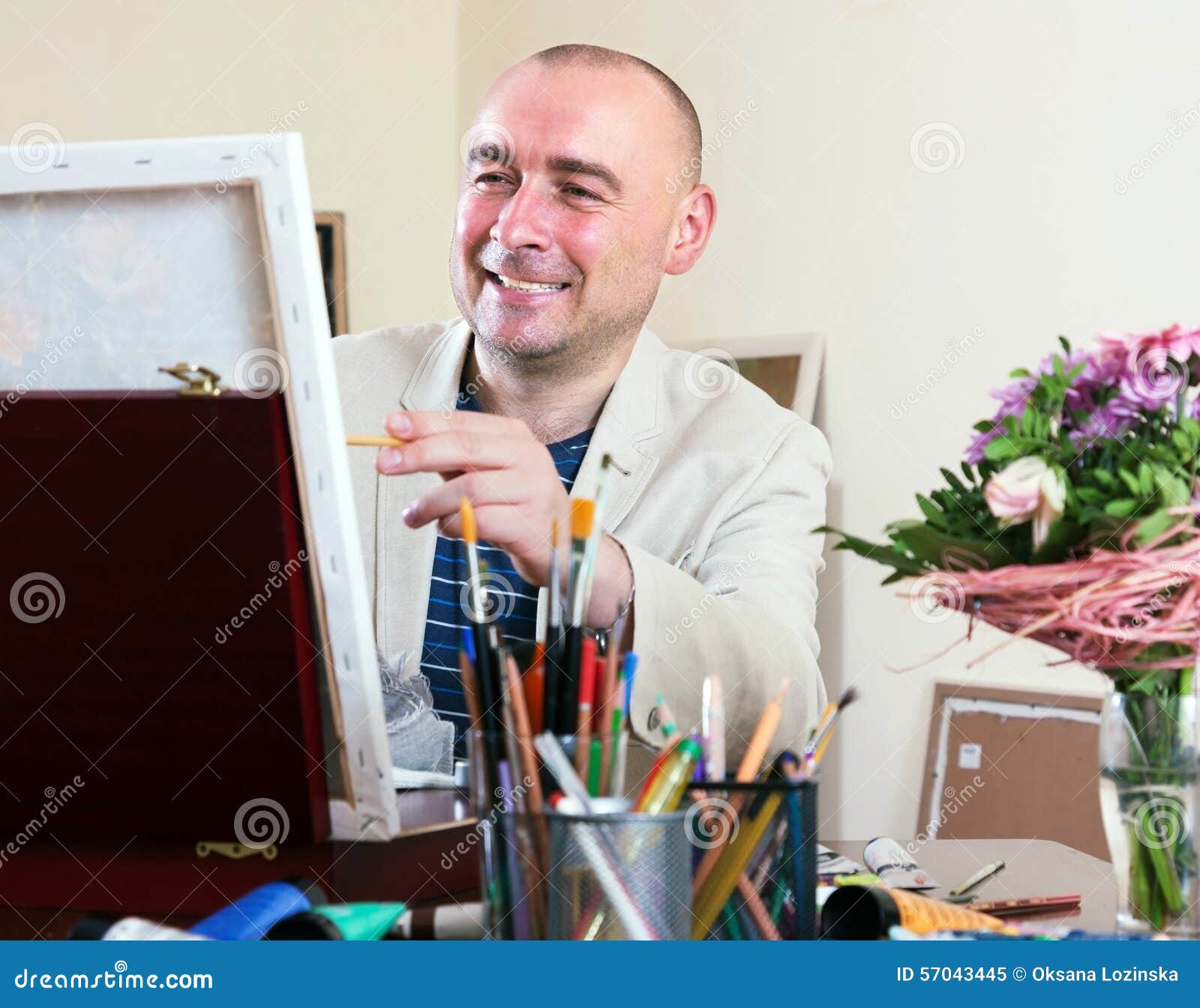 Happy artist draws stock image. Image of lifestyles, arts - 57043445