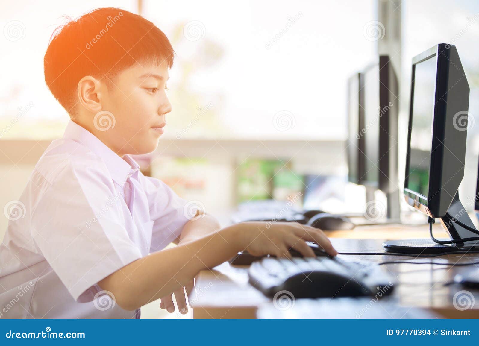 Happy Asian Boy in Student Uniform Using Computer at School . Stock ...