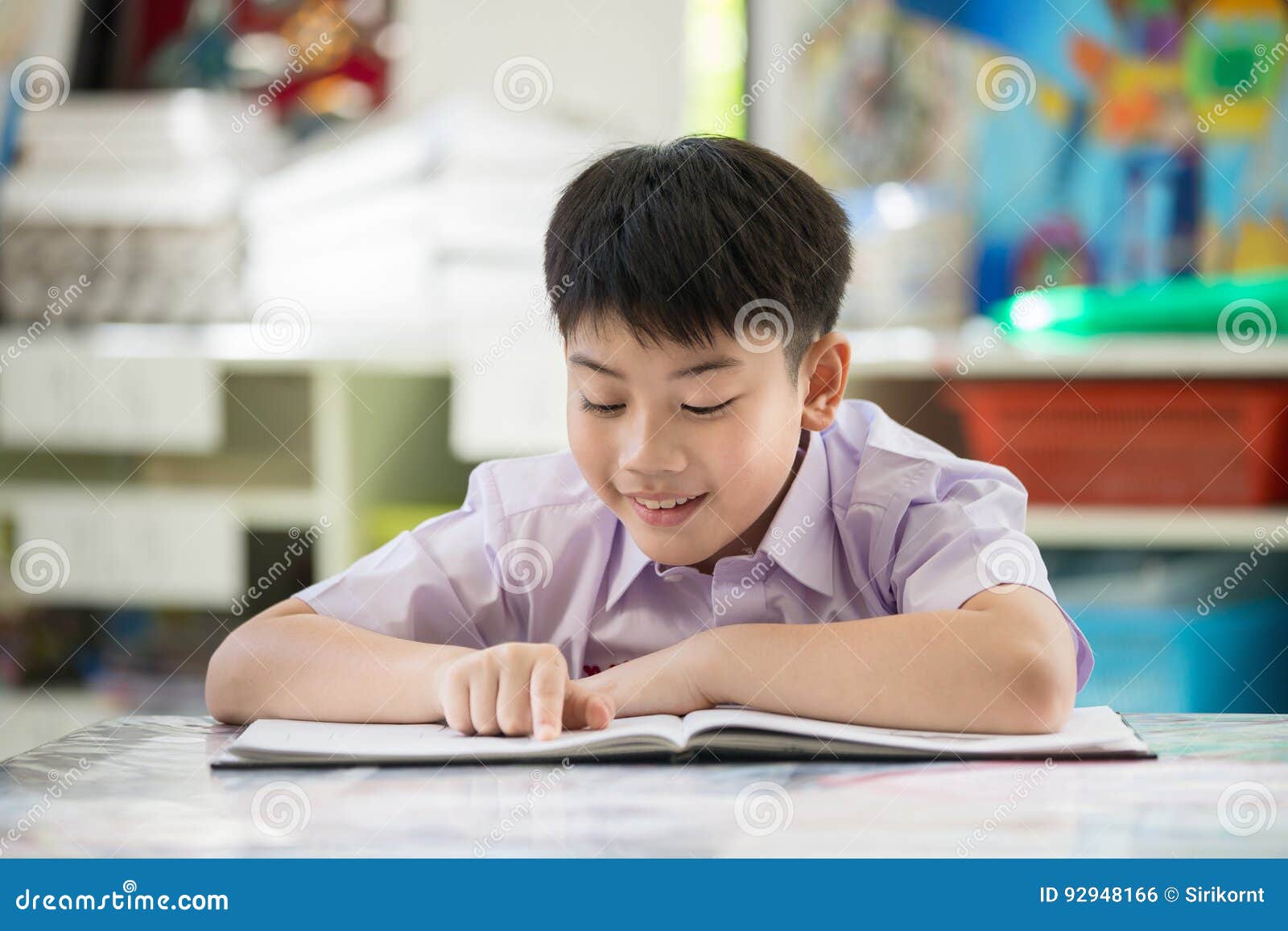 Happy Asian Child Reading Book with Smile Face. Stock Photo - Image of ...
