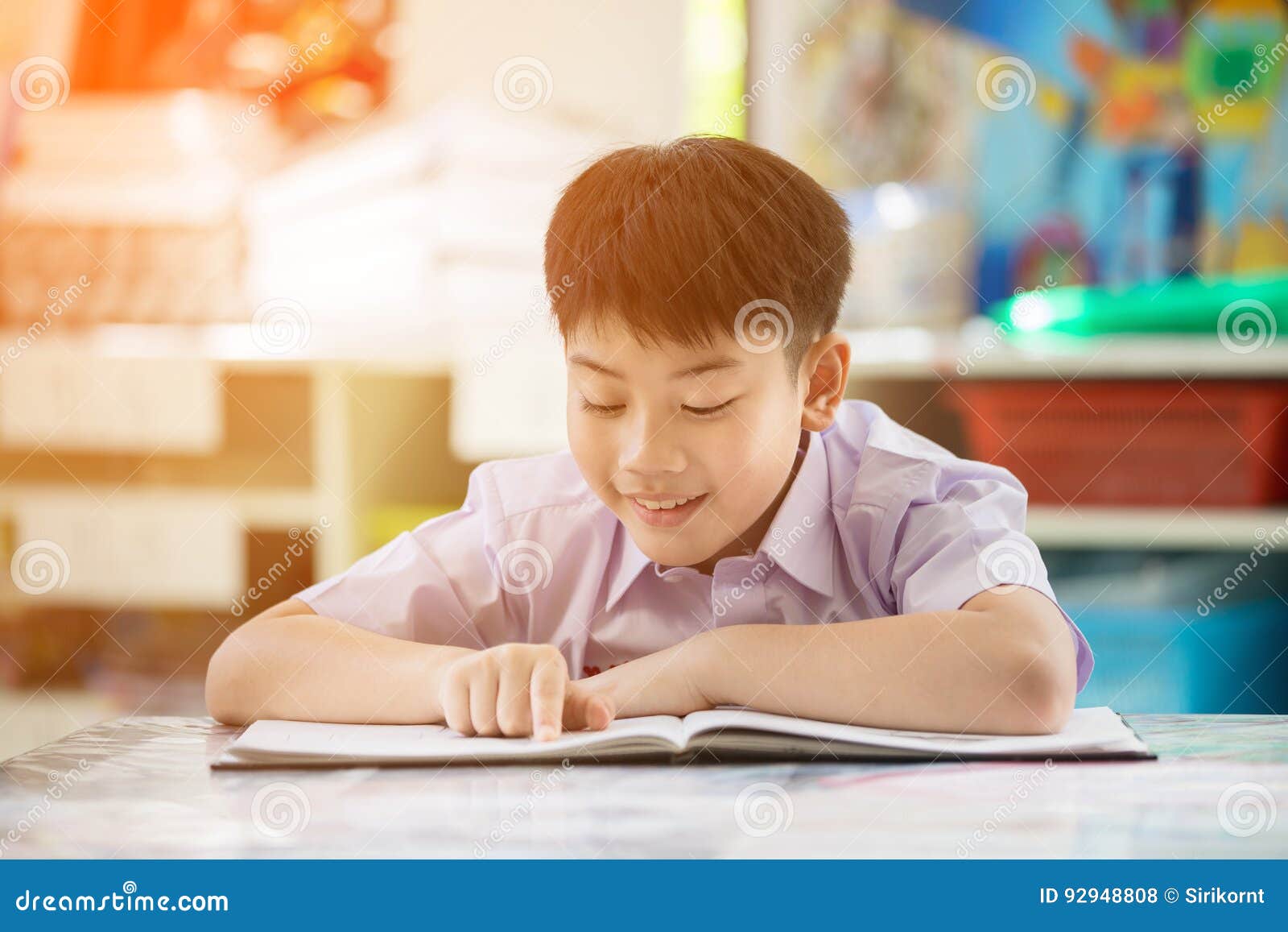 Happy Asian Child Reading Book with Smile Face. Stock Photo - Image of ...