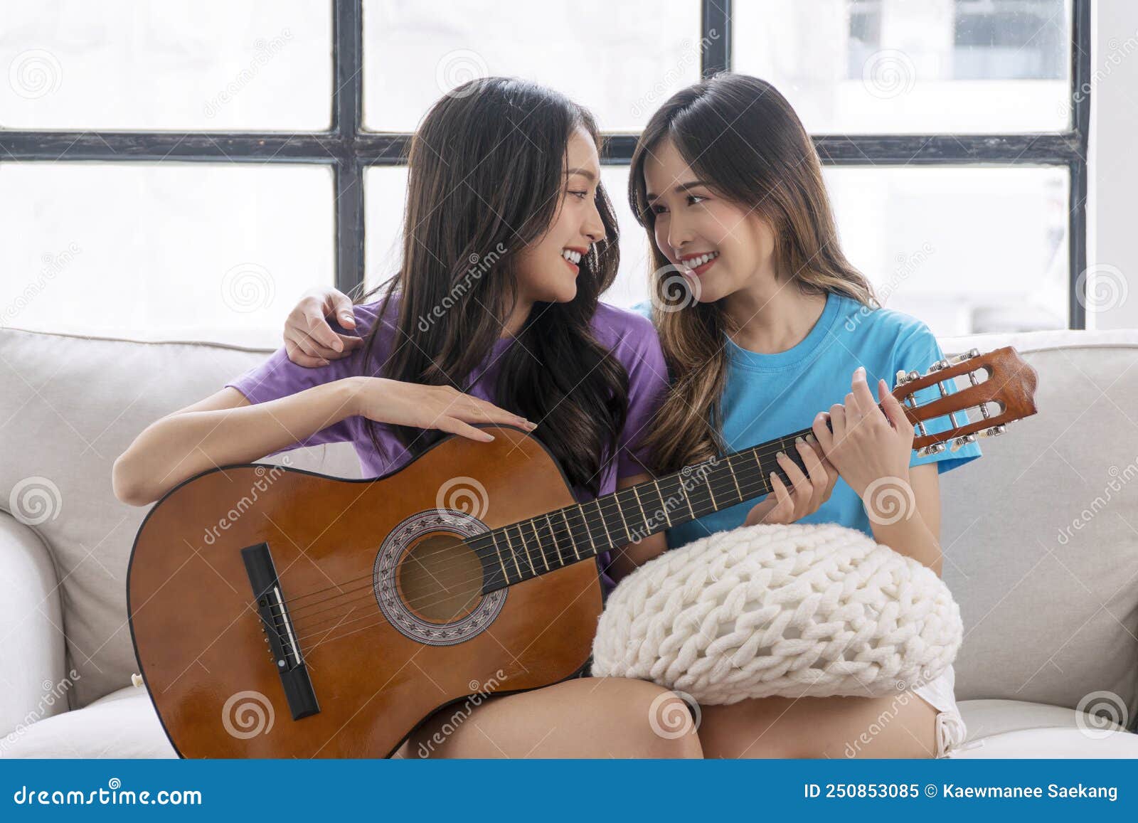 Happy Asian Couple Lesbian Woman Playing Acoustic Guitar Sitting