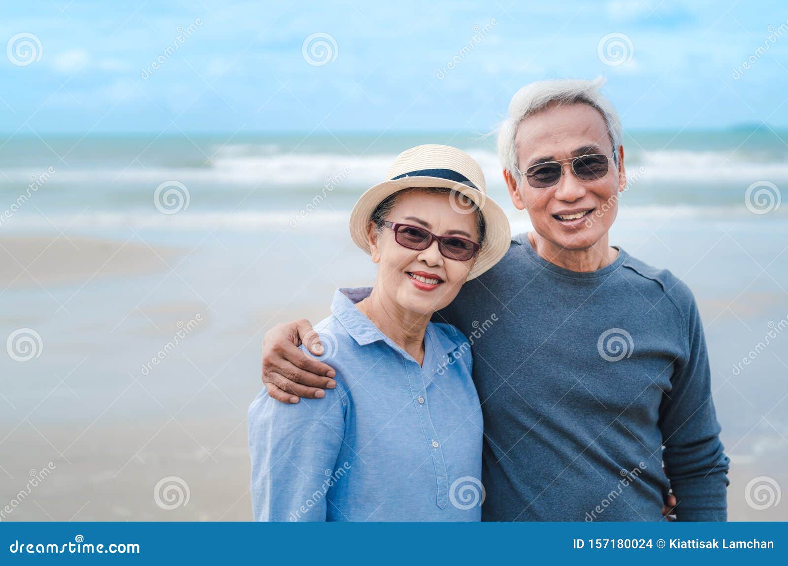 Happy Asian Couple Senior Eldery Retirement Resting At Beach Honeymoon