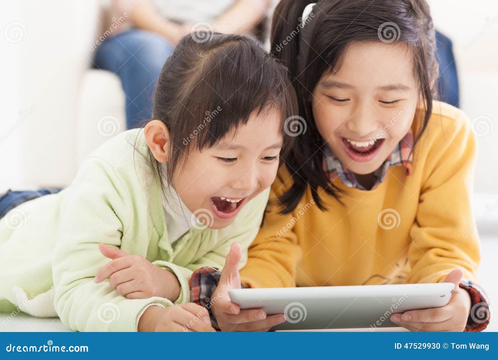 Happy Asian Little Girls Using Tablet Stock Photo - Image of cheerful ...