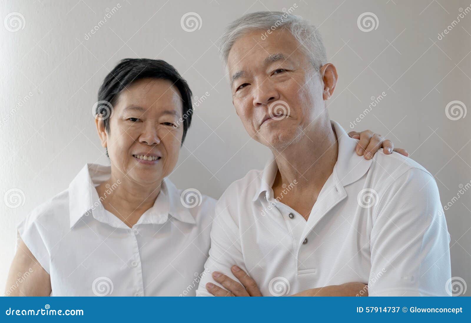 Happy Asian Senior Couple White Background Love And Hug Stock Image