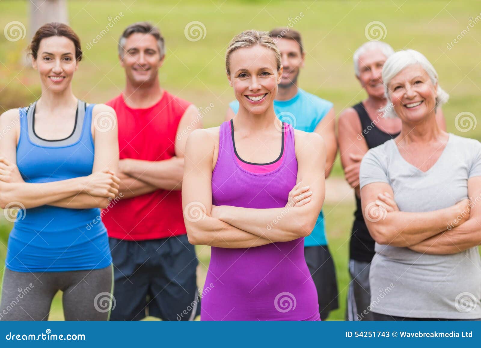 Happy Athletic Group Smiling Camera Hands Crossed Stock Photos - Free ...