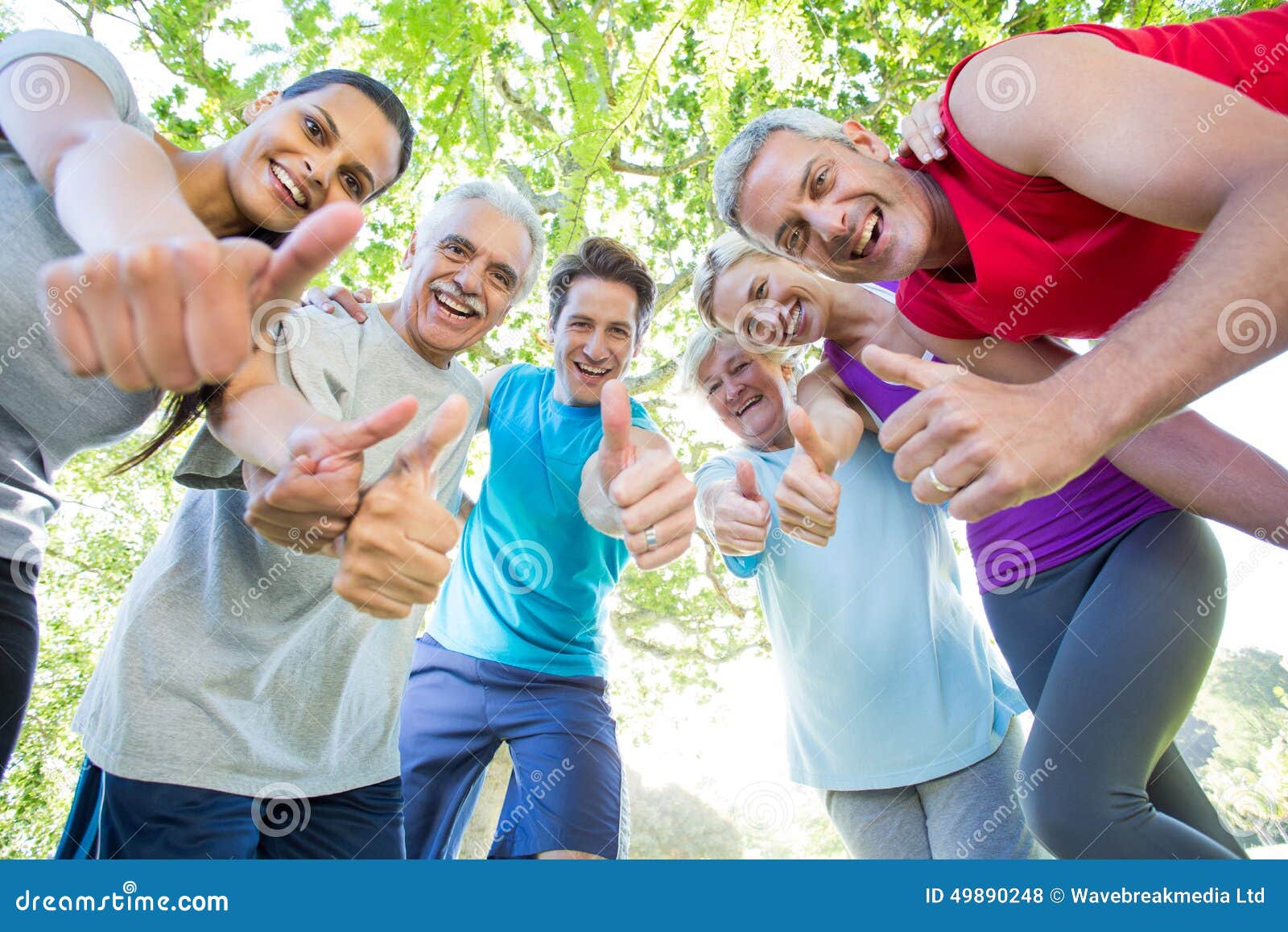Happy Athletic Group with Thumbs Up Stock Photo - Image of parkland ...