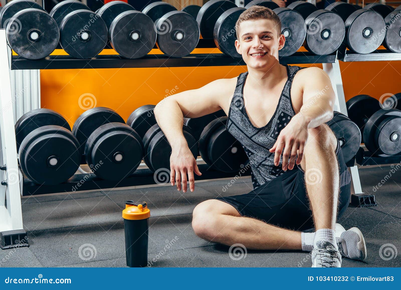 Happy Attractive Man Resting after a Workout at the Gym. Stock Photo ...
