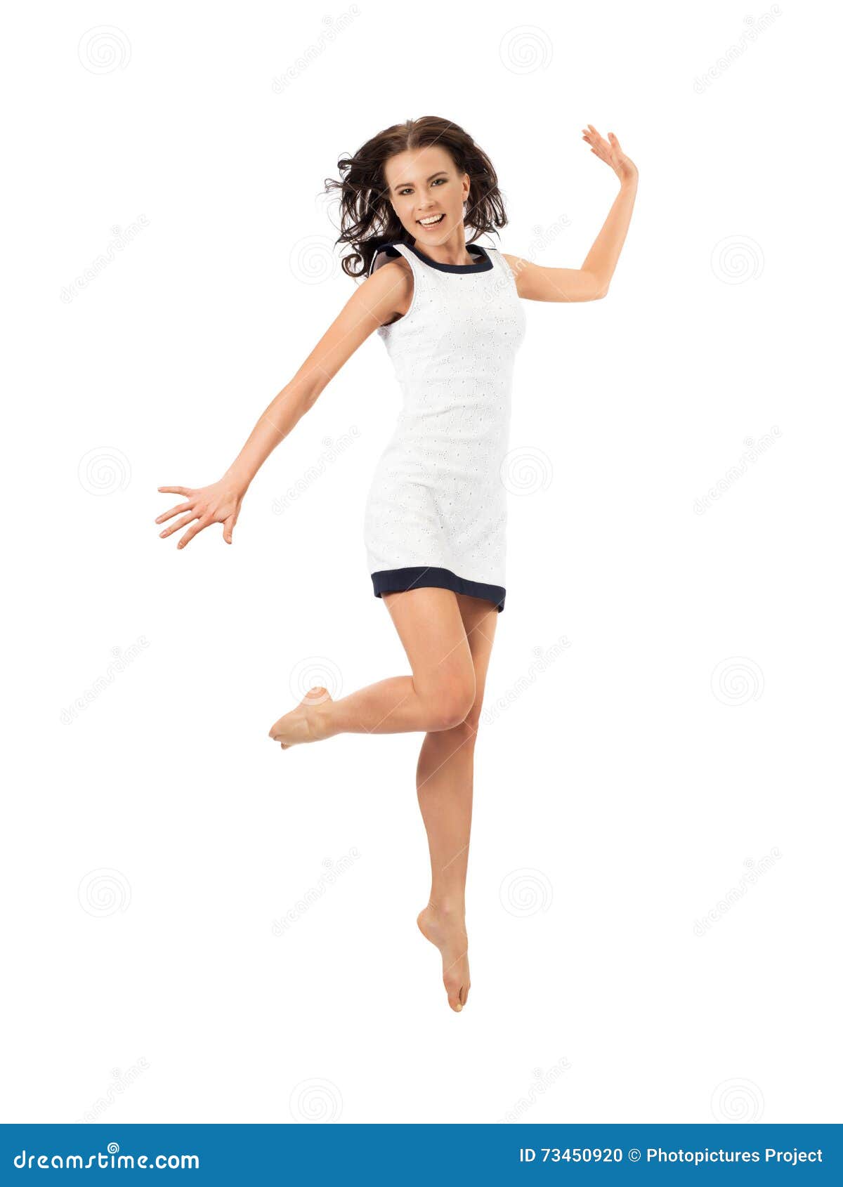 Happy Attractive Woman Jumping in Studio. Stock Photo - Image of ...