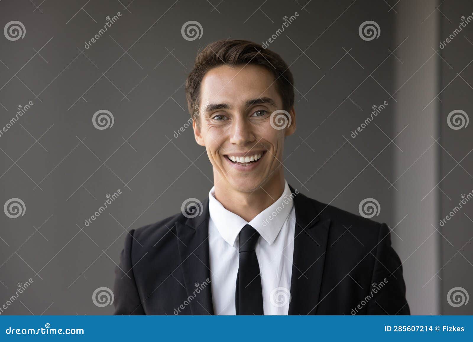 Happy Attractive Young Businessman in Formal Suit and Tie Stock Photo ... Happy Attractive Young Businessman in Formal Suit and Tie Stock Photo ...