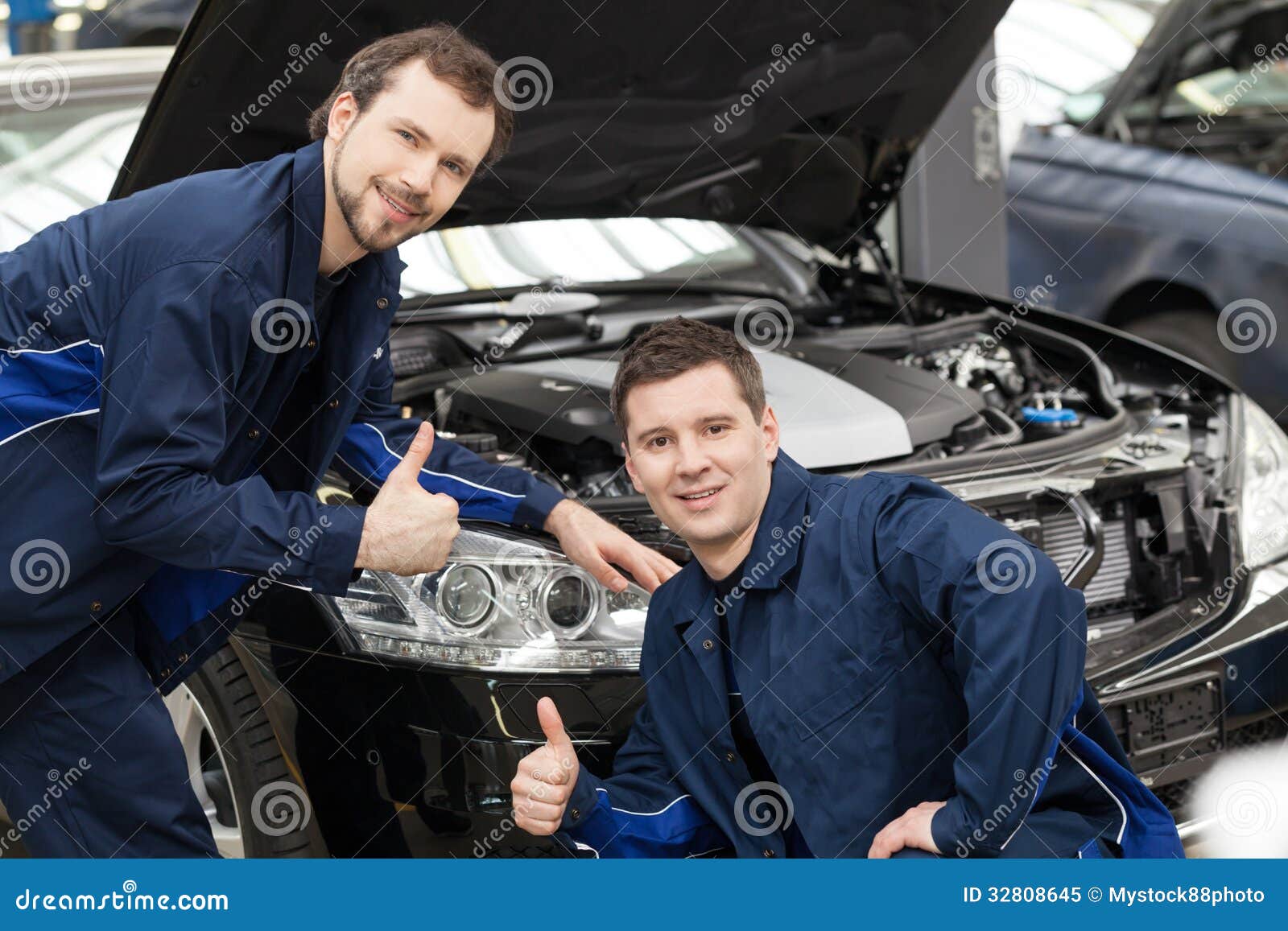 Happy auto mechanics. stock image. Image of hand, mode - 32808645
