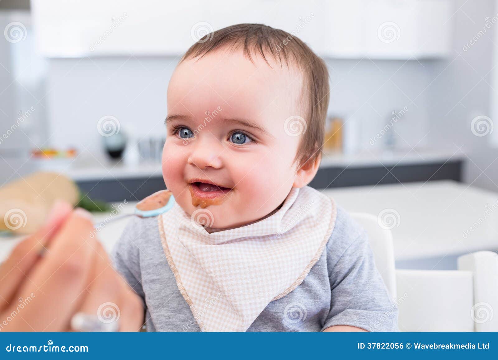 Happy Baby Being Fed by Mother Stock Photo - Image of sweet, leisure ...