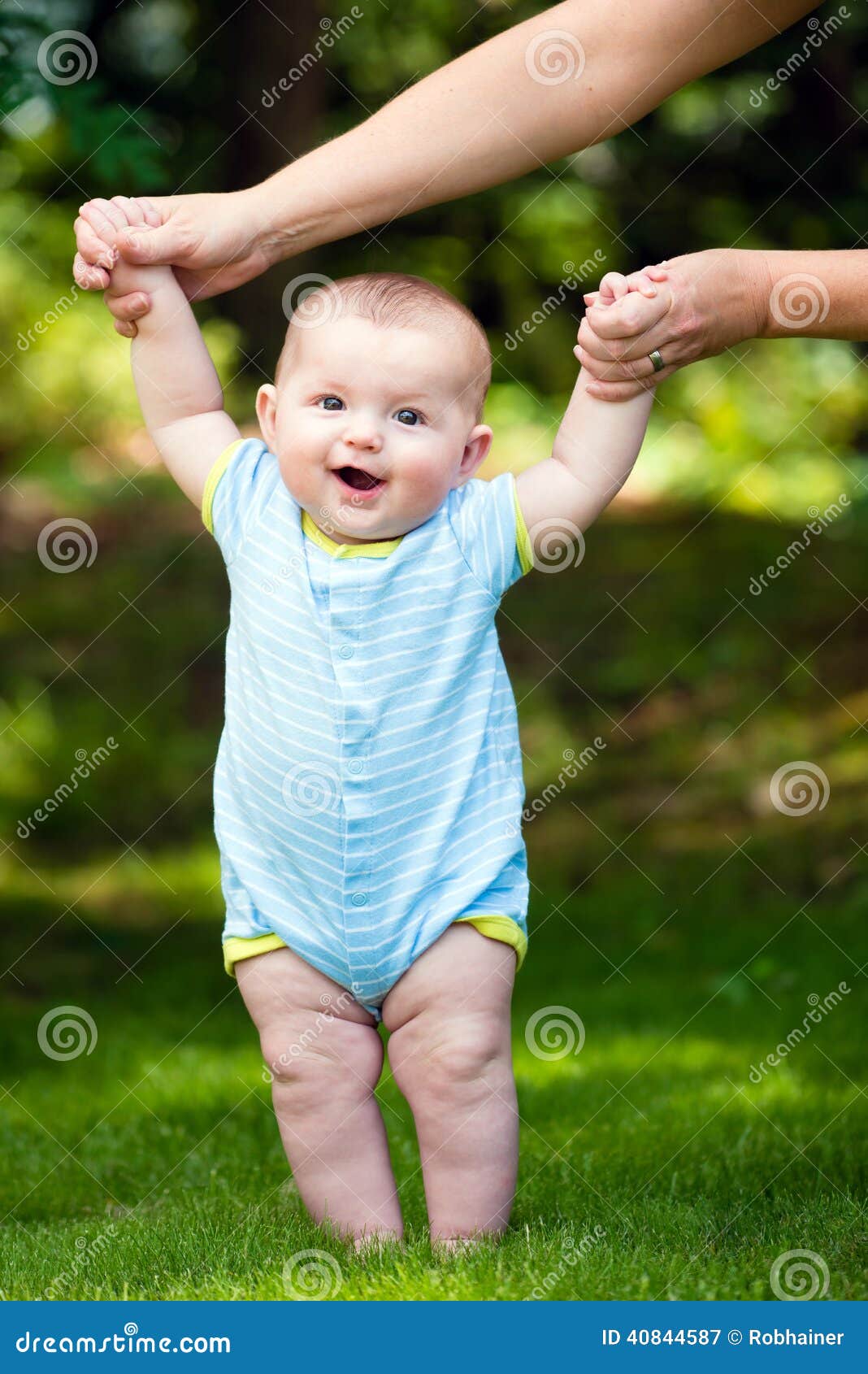 Happy Baby Boy Learning To Walk On Grass Stock Image - Image: 40844587