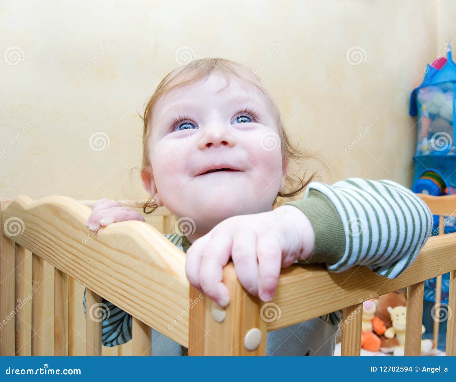 Happy baby boy looking up stock photo. Image of childhood - 12702594