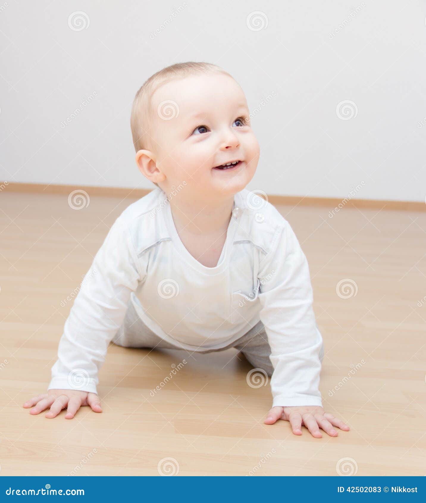 Happy baby crawling stock image. Image of adorable, male - 42502083