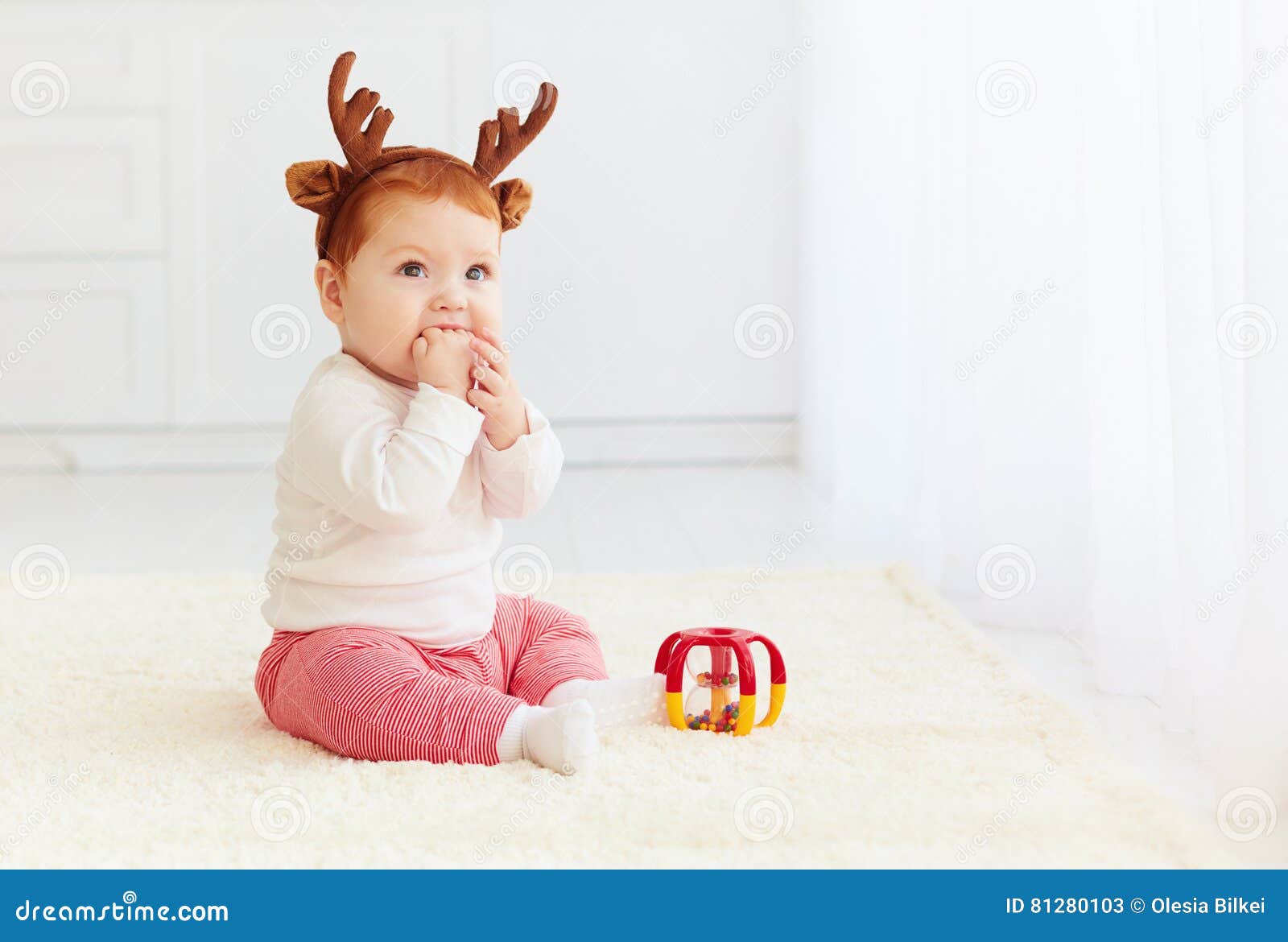 Happy Baby Deer Playing with Toy at Home Stock Image - Image of finger ...