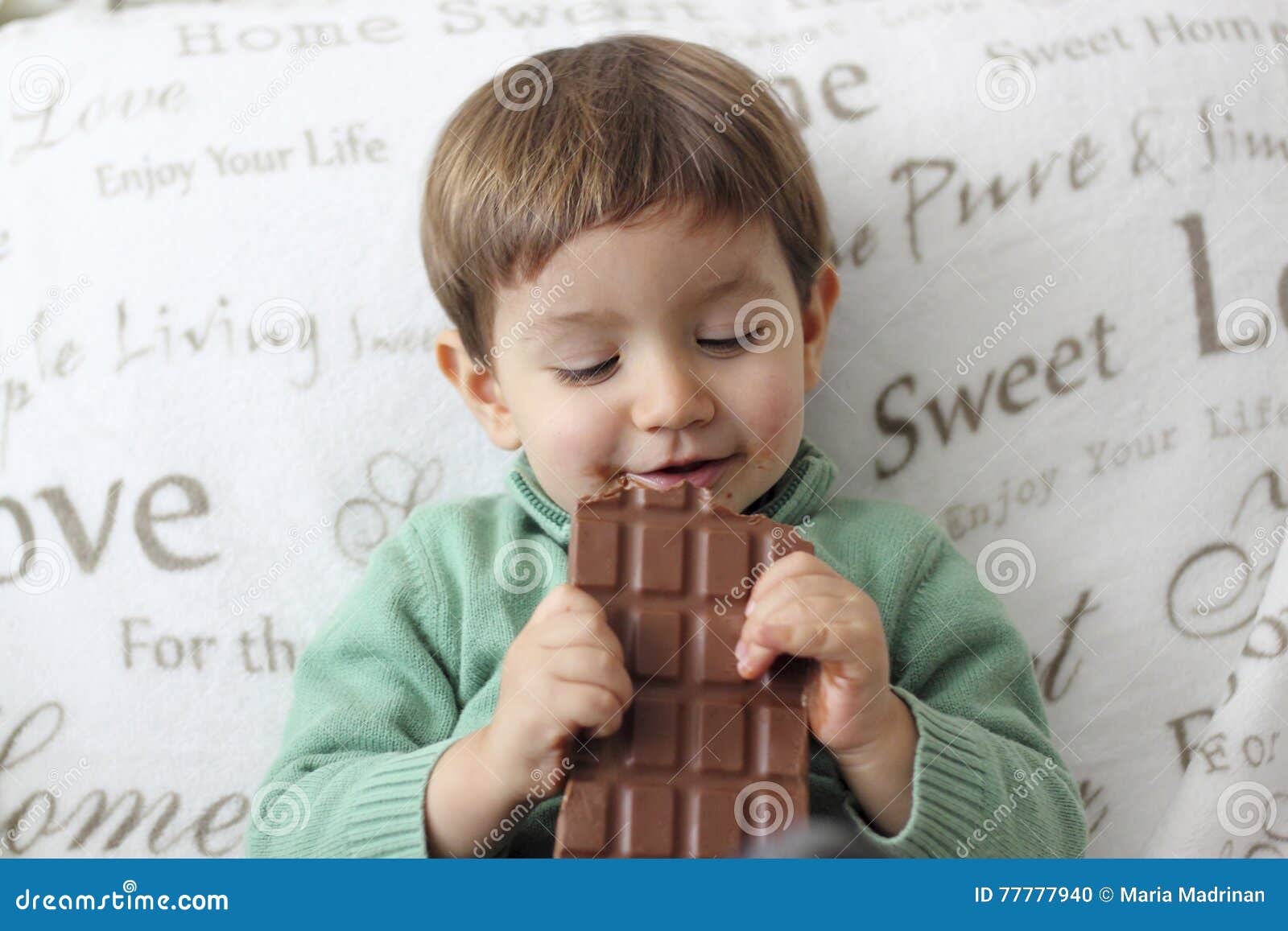 Happy Baby Eating a Chocolate Tablet Stock Photo - Image of childhood ...