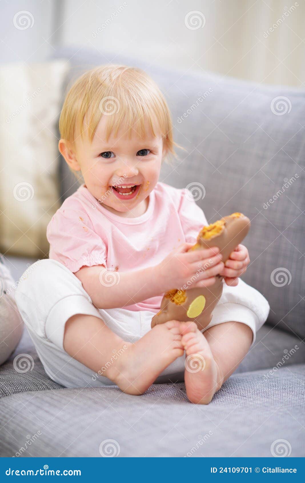 Happy Baby Eating Easter Rabbit Cookie Stock Image - Image of cookie ...