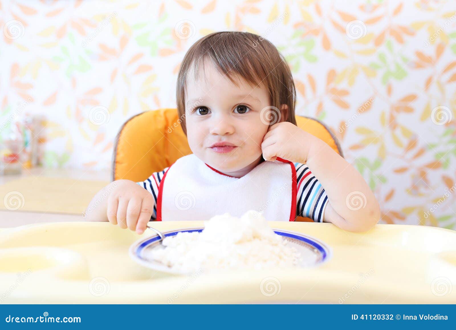 Happy baby eating quark stock photo. Image of nice, yearling - 41120332