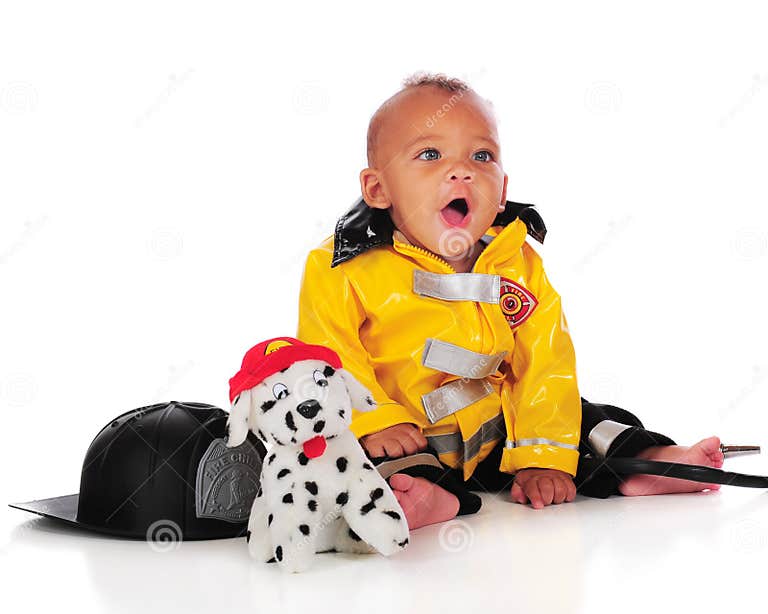 Happy Baby Fireman stock photo. Image of caucasian, dalmation - 16184962