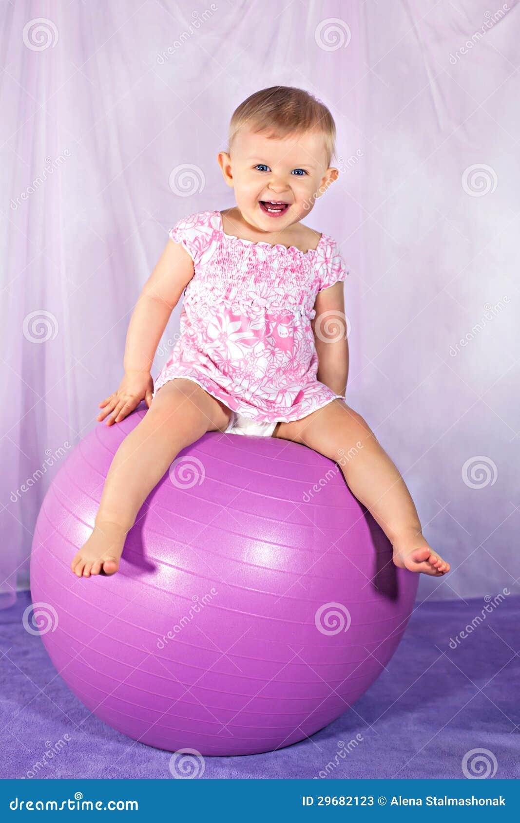 Happy baby girl on ball stock image. Image of smile, infant - 29682123