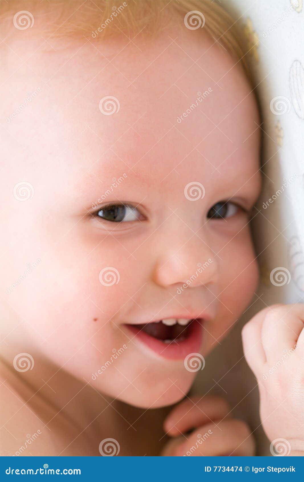 Happy Baby Lean On The Wall Picture. Image: 7734474