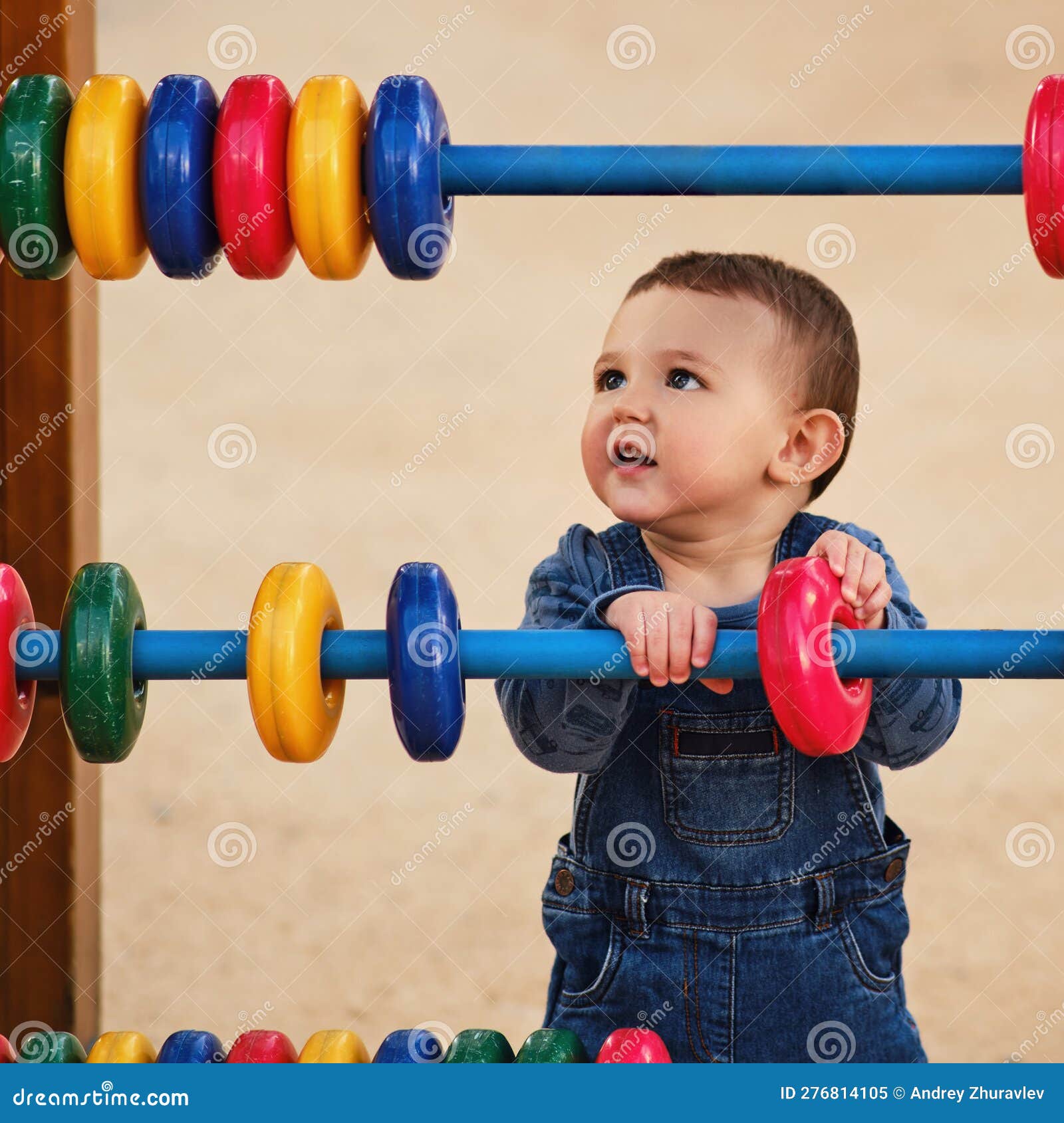 Happy Baby Learning Math on Abacus while Playing on Playground Stock ...