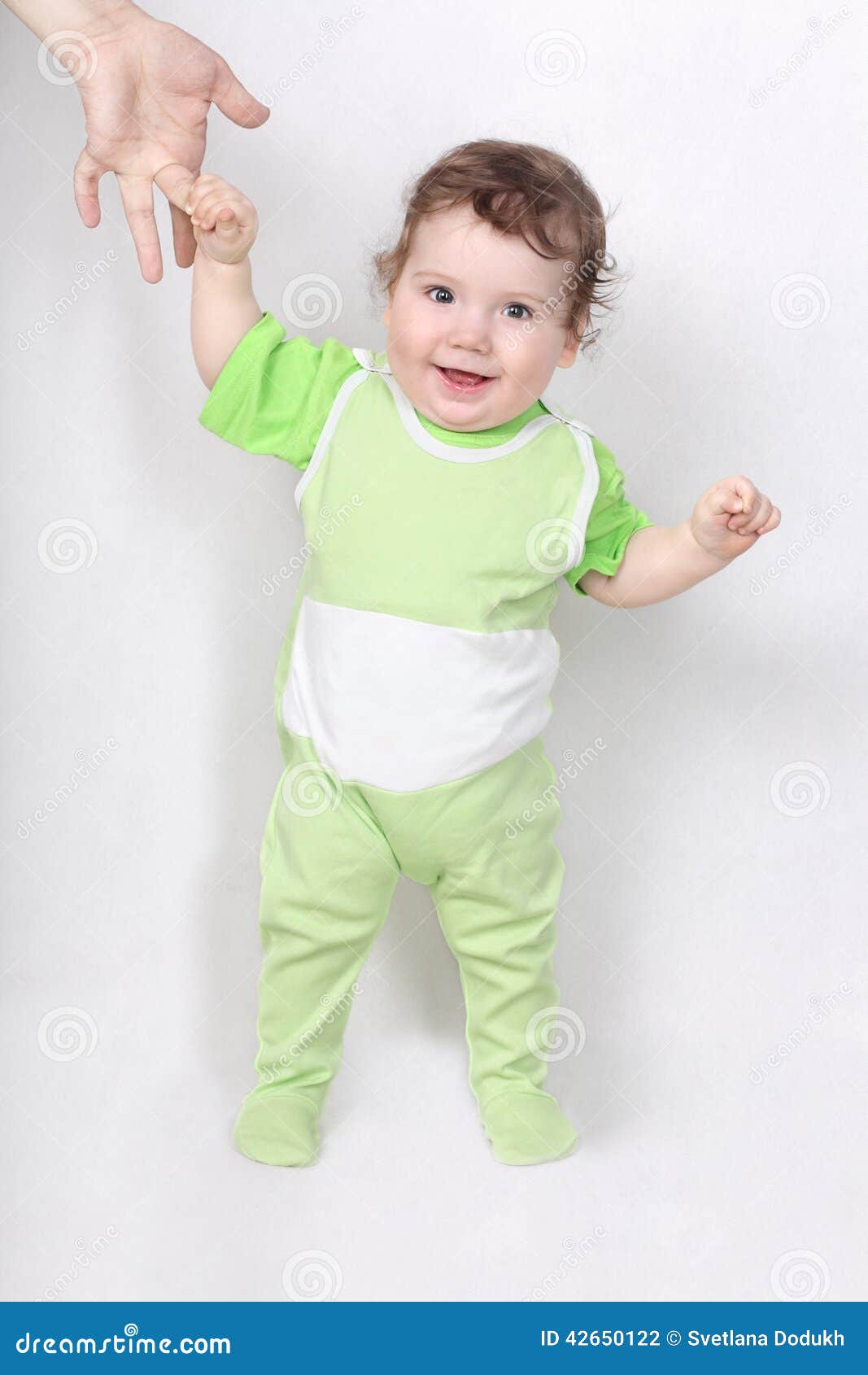Happy Baby Making First Steps Stock Photo - Image of father, infant ...