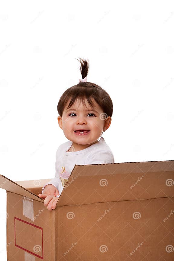 Happy baby in moving box stock image. Image of ponytail - 17582957