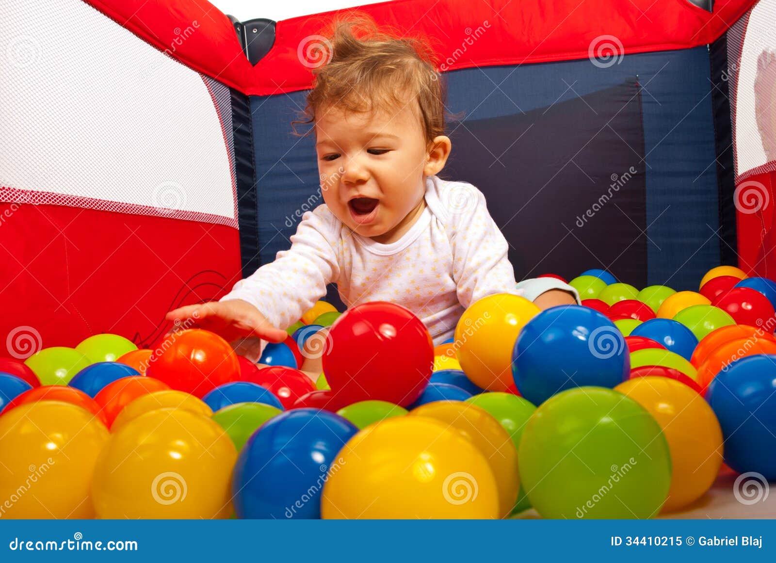 Happy Baby Playing with Balls Stock Image - Image of activity, plenty ...